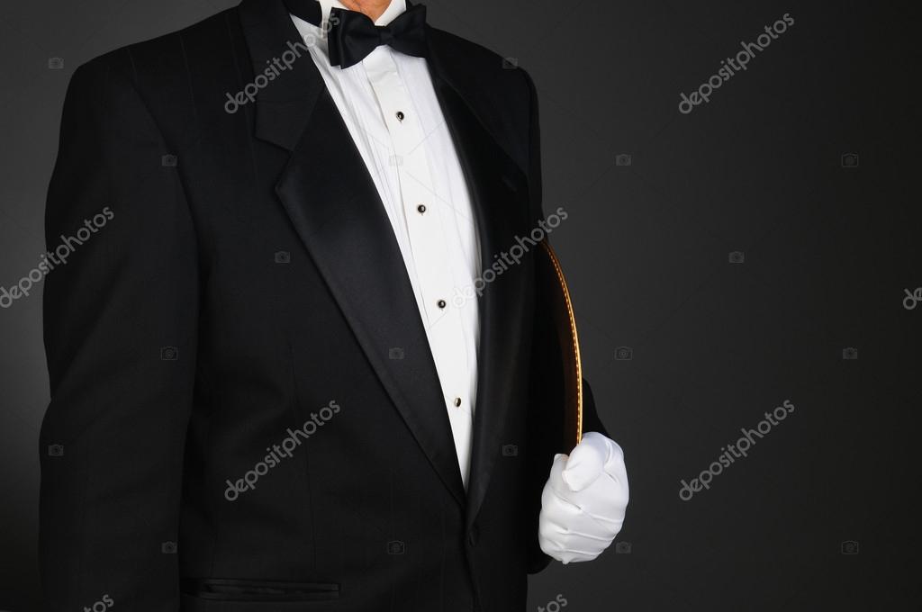 Waiter Holding Serving Tray Under His Arm Stock Photo by ©scukrov 14724009