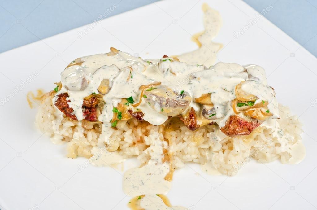 Risotto with chicken liver — Stock Photo © olinchuk #17954101