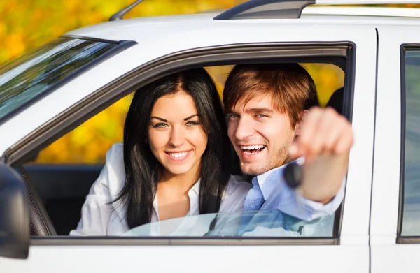 Young happy couple driving - Stock Image - Everypixel