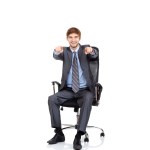 Businessman happy smile sitting in chair Stock Photo by ©mast3r 31742831