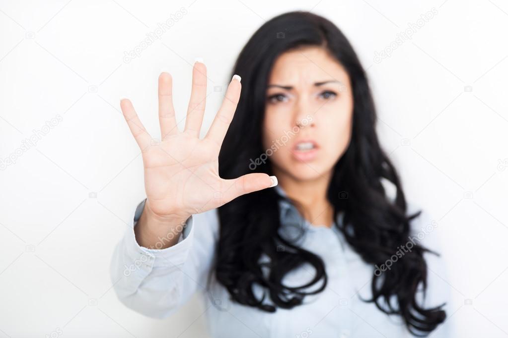 Woman making stop hand sign — Stock Photo © mast3r #31743605