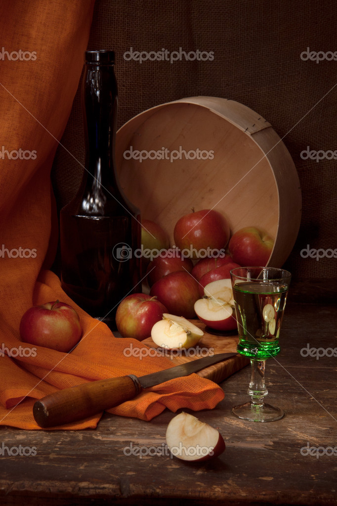 Vintage still life with alcohol and apples Stock Photo by ©krontus 46127337
