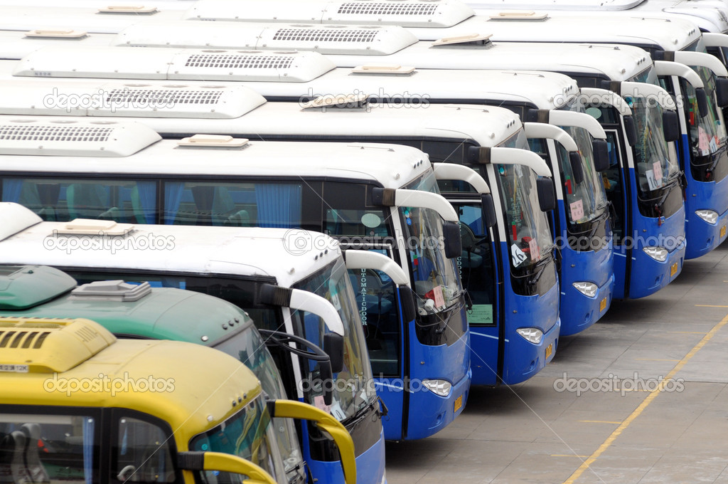 Tourist buses on a parking expect passengers Stock Photo by ©donkeyru ...