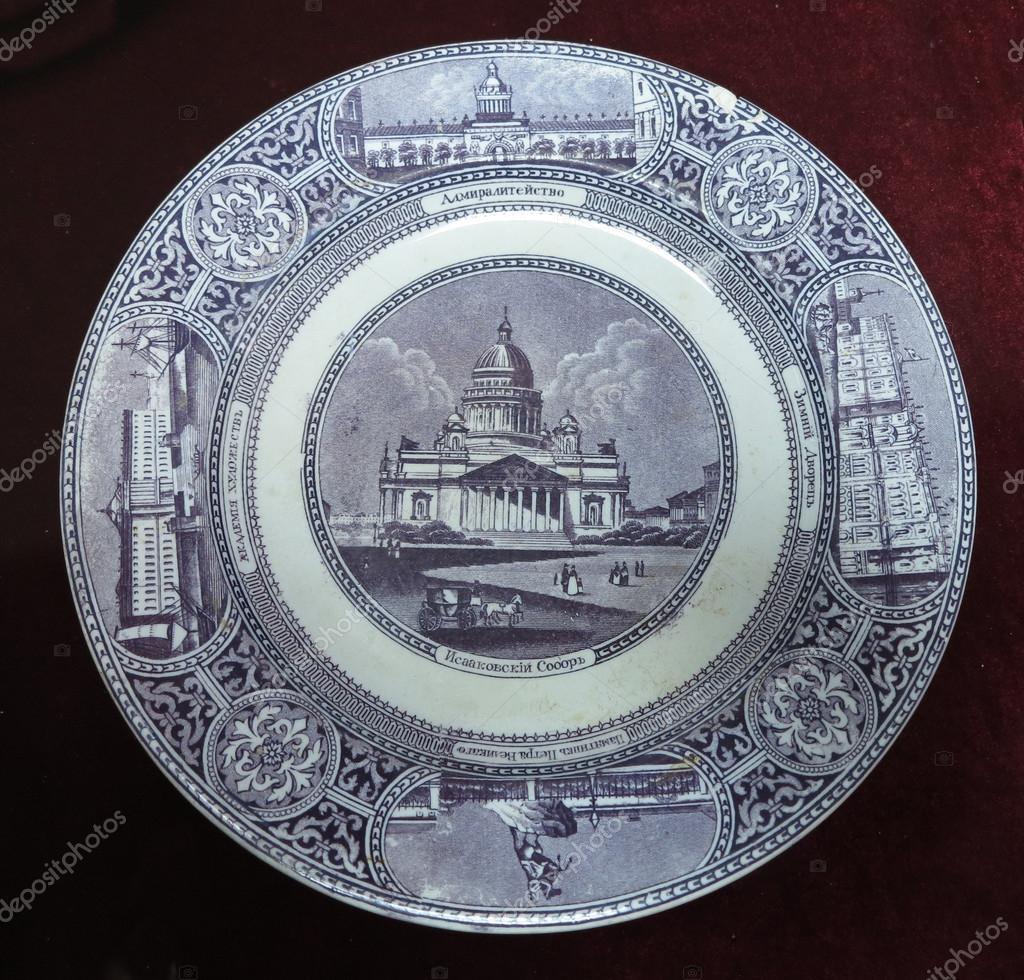 19th Century vintage old plate with paintings isolated over whit Stock ...