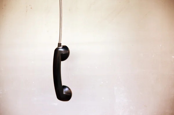 Hanging phone receiver Stock Photo by ©stevanovicigor 17889541