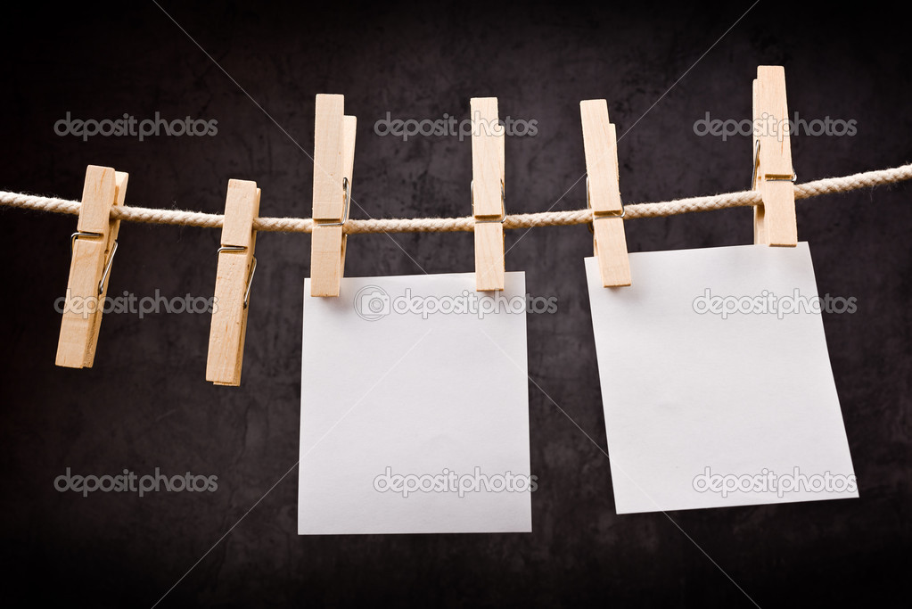 Two Blank paper notes hanging on rope with clothes pins — Stock Photo ...