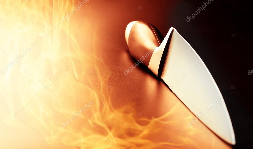 Professional knife on kitchen fire — Stock Photo © Nomadsoul1 #18183267