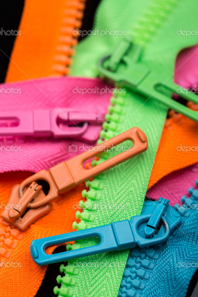 Zipper pull tabs — Stock Photo © marimoart #41199013 Zipper pull tabs — Stock Photo © marimoart #41199013