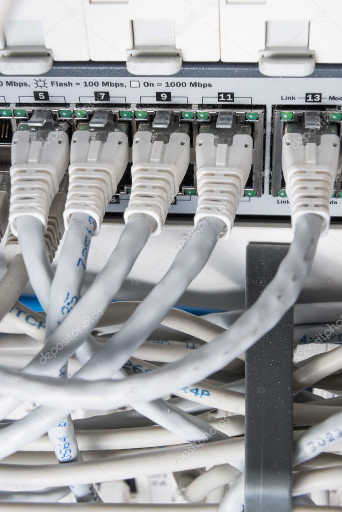 Network hub and patch cables Stock Photo by ©kubais 21882329