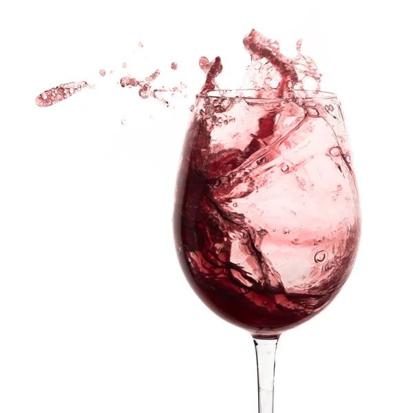 Wine splashing from wineglass in heart shape — Stock Photo © Nomadsoul1 ...