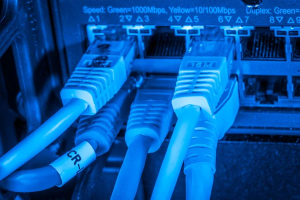 Network hub and patch cables Stock Photo by ©kubais 30782729