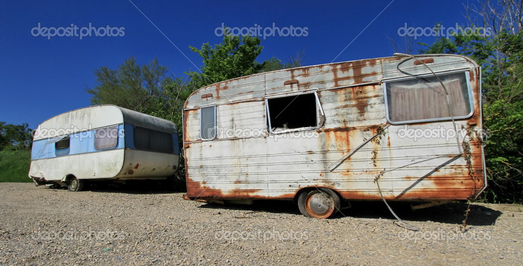 Dusty abandonned old caravans — Stock Photo © Elenarts #25876135