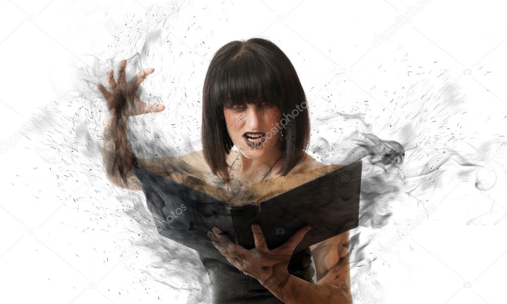 Woman with a magic book Stock Photo by ©melektaus 35663175