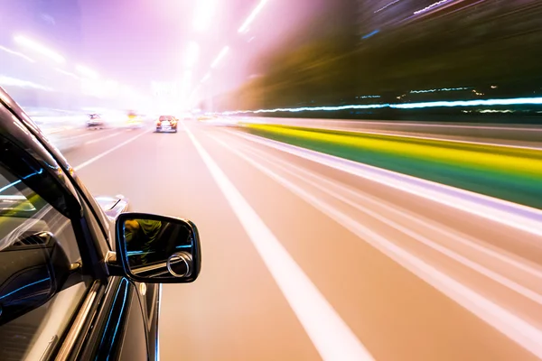 Car driving fast Stock Photo by ©zhudifeng 29100407