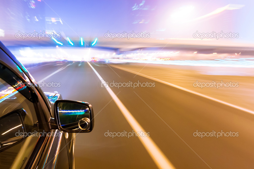 Car driving fast Stock Photo by ©zhudifeng 29099831