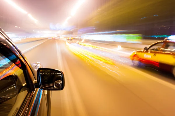 Car driving fast Stock Photo by ©zhudifeng 29100407