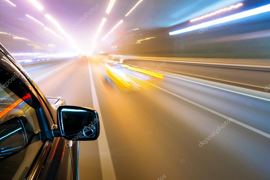 Car driving fast Stock Photo by ©zhudifeng 29100407