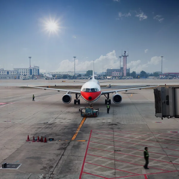 Airplane stop in the airport Stock Photo by ©zhudifeng 34845033