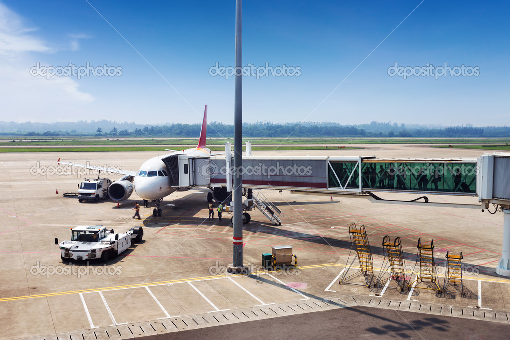 Airplane stop in the airport Stock Photo by ©zhudifeng 34845033