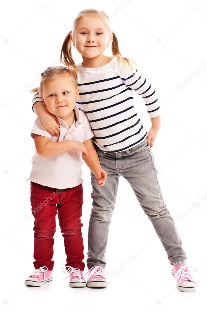 Two sisters posing in studio Stock Photo by ©jirkaejc 18636145