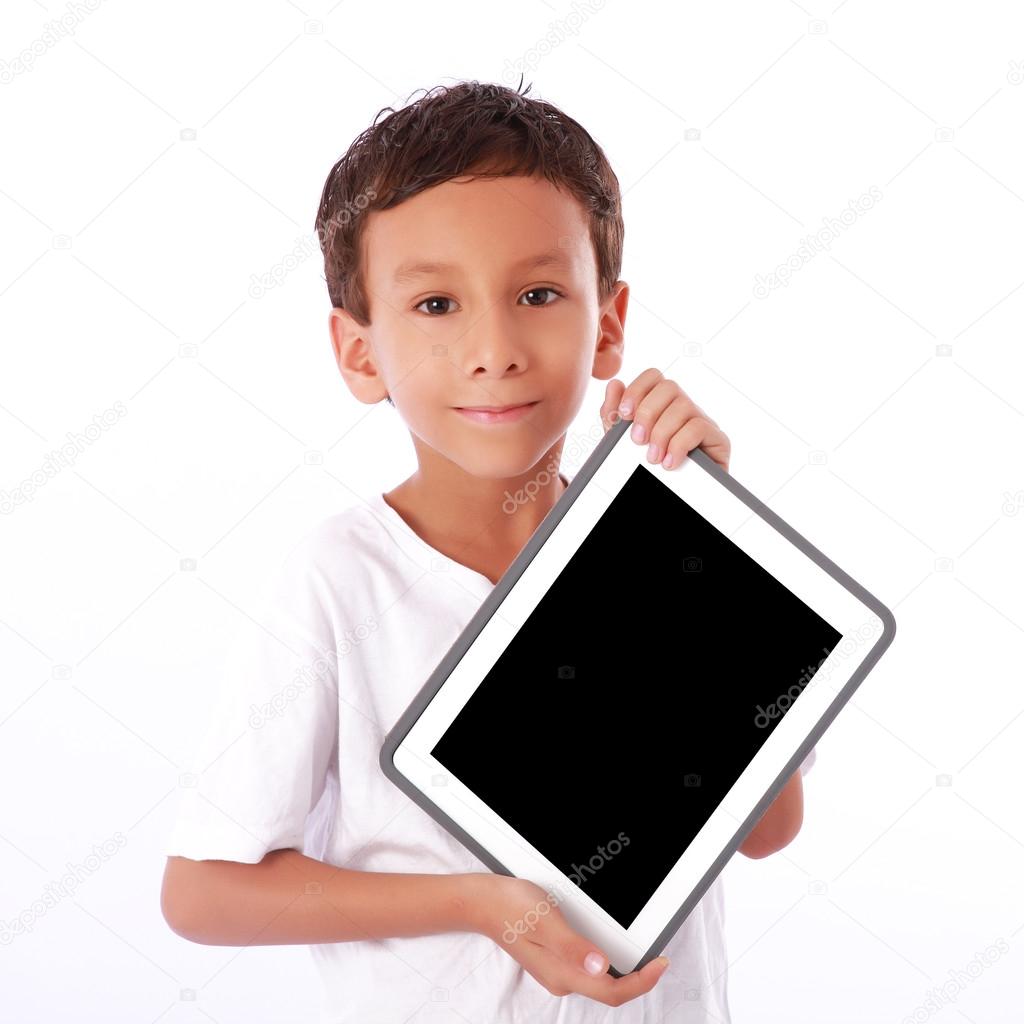 Boy showing a tablet Stock Photo by ©yupiramos 22640205