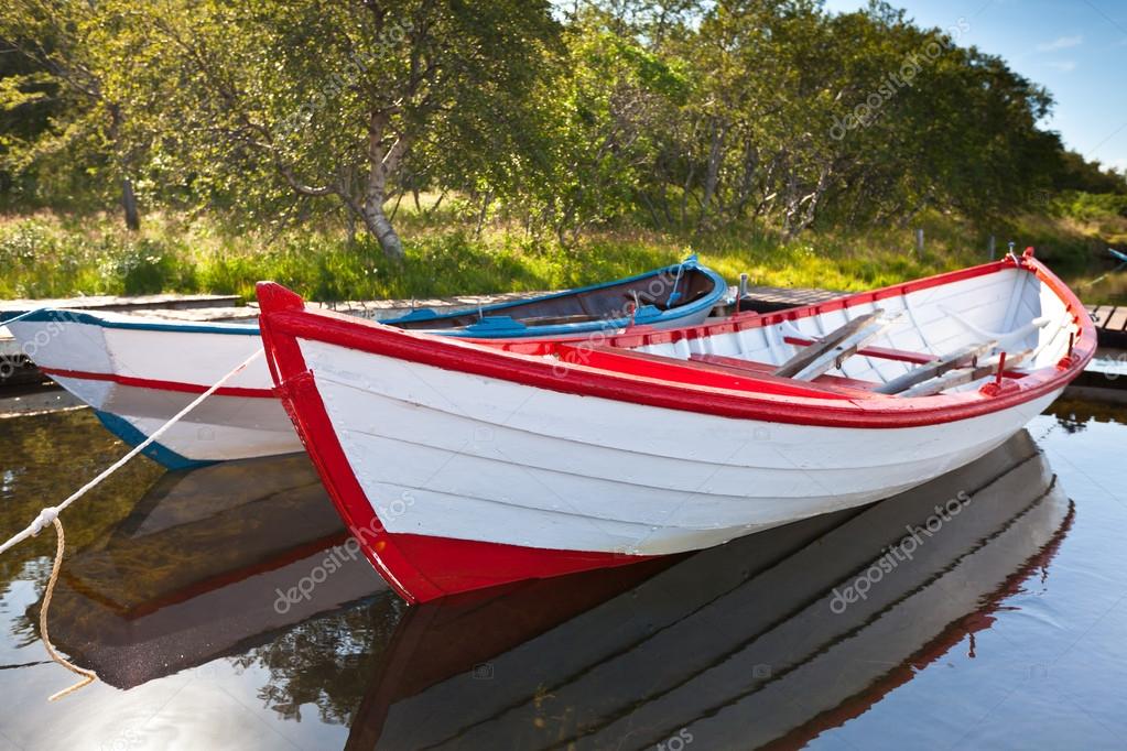 Floating Wooden Boats with Reflection in a Water — Stock Photo ...