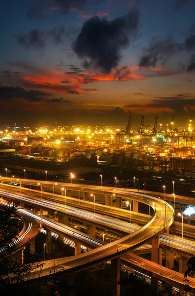 Overpass bridge and pier in night - Stock Image - Everypixel