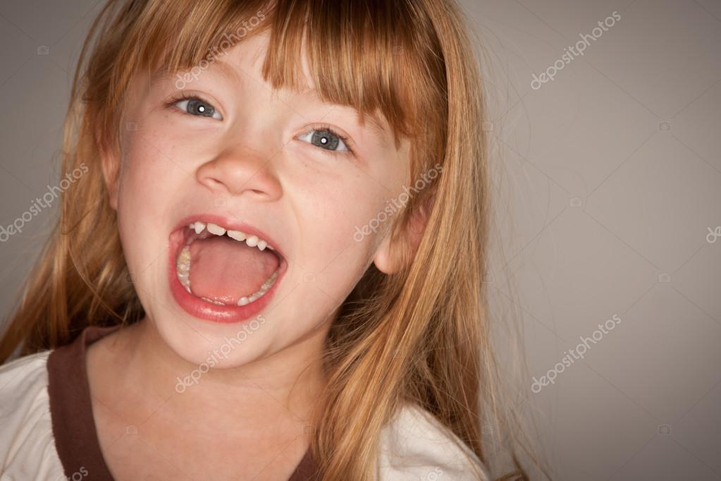Fun Portrait of an Adorable Red Haired Girl on Grey — Stock Photo ...