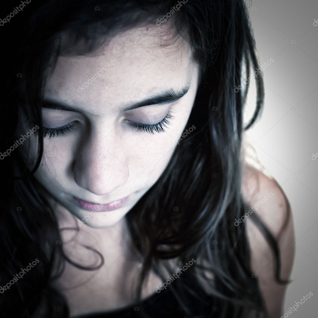 Portrait of a sad hispanic girl — Stock Photo © kmiragaya #16789713