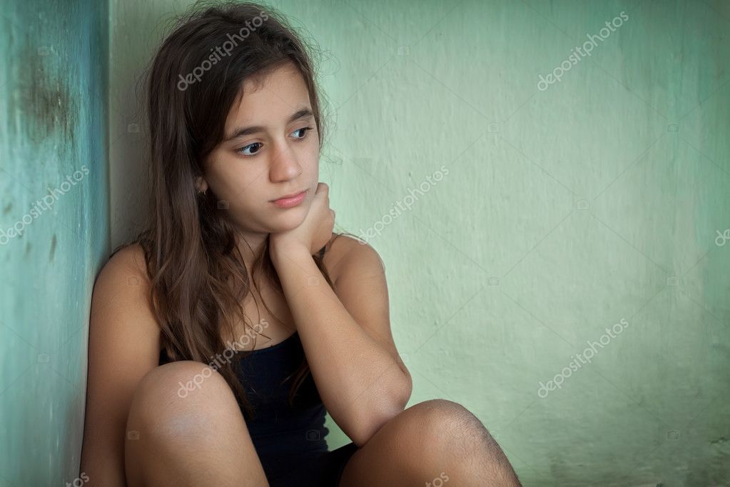Sad and lonely hispanic girl Stock Photo by ©kmiragaya 16789719