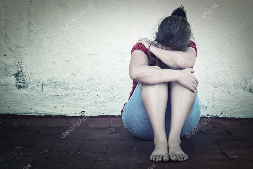 Sad woman crying — Stock Photo © kmiragaya #40643031