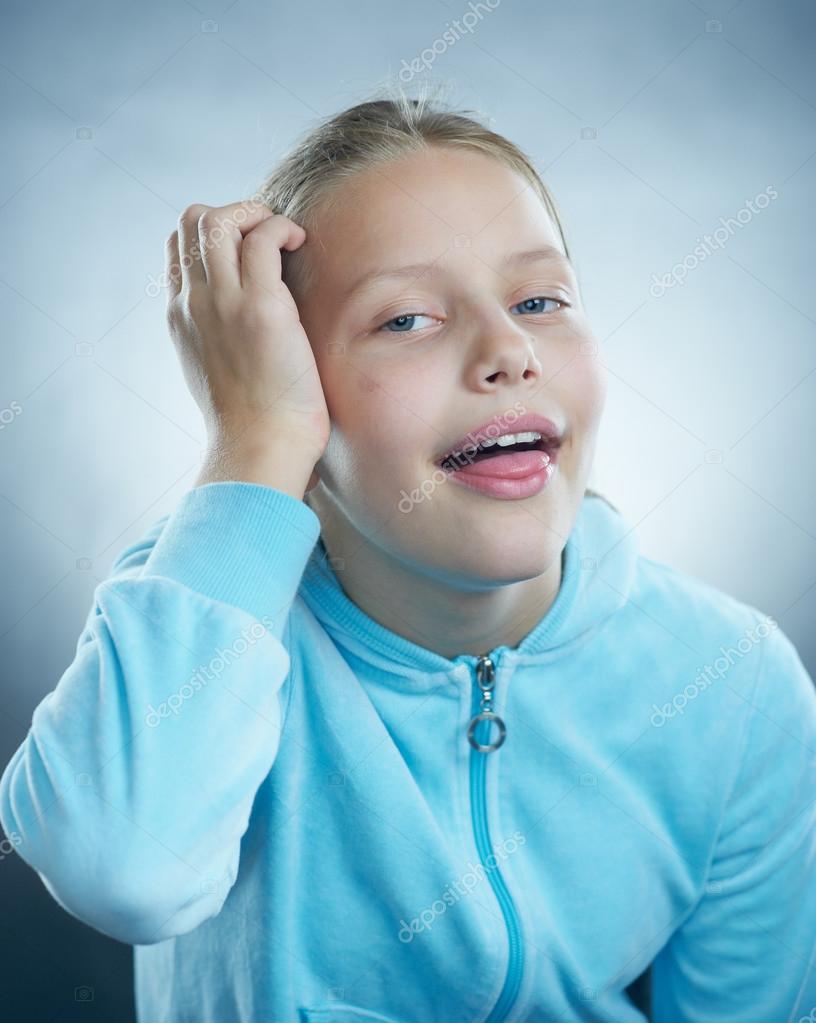 Little girl with silly face. Stock Photo by ©dontcut 13496993