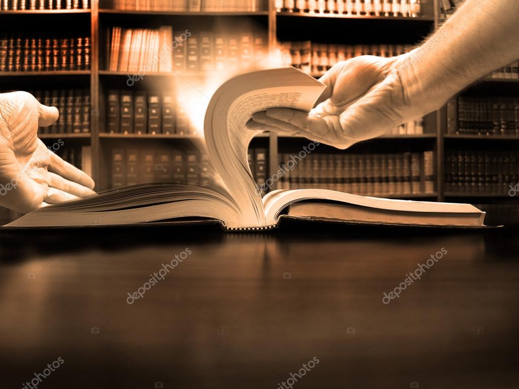 Hand Turning Pages on oldBook Stock Photo by ©eric1513 43997443