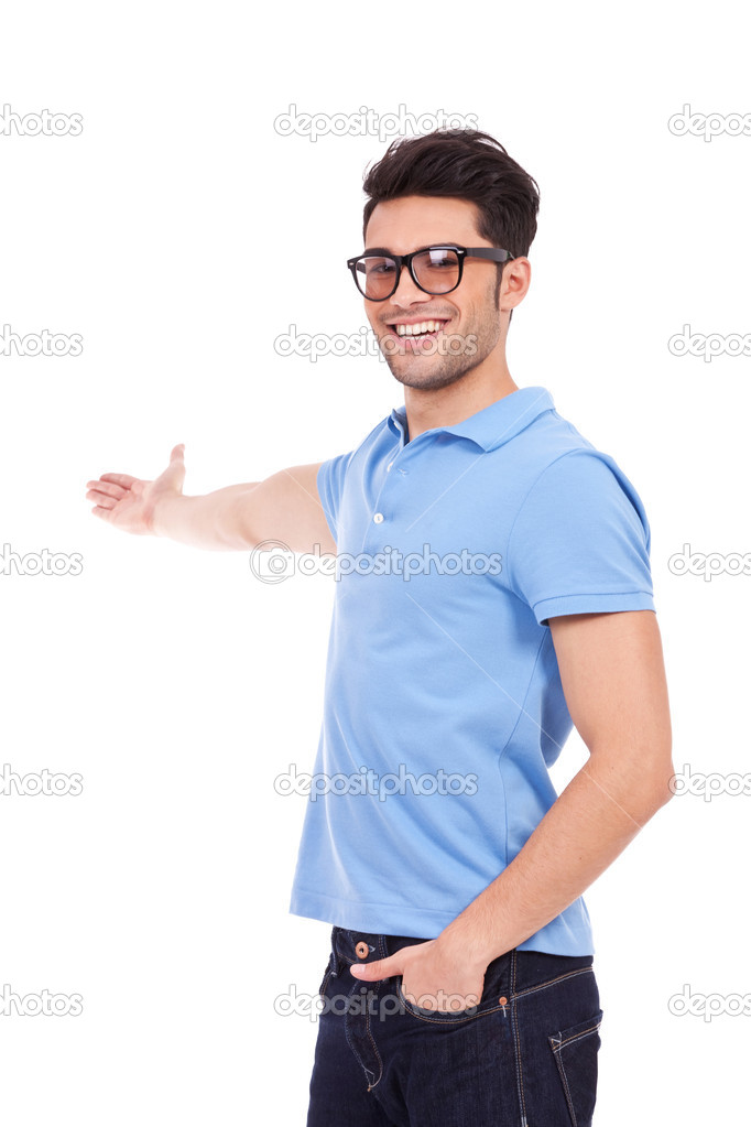 Young man pointing to the back — Stock Photo © feedough #13515739