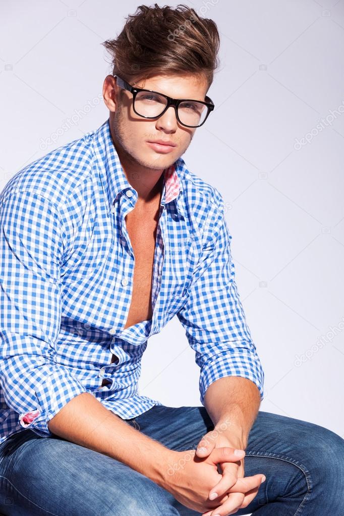 Calm fashion model looking at the camera Stock Photo by ©feedough 14041632