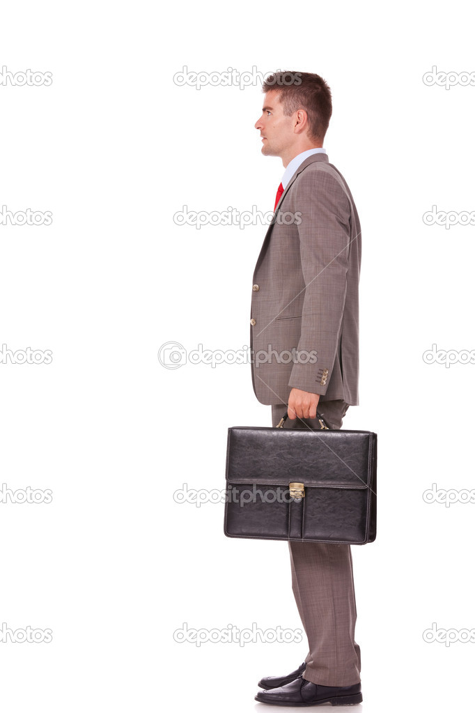 Business man holding suitcase Stock Photo by ©feedough 14590577