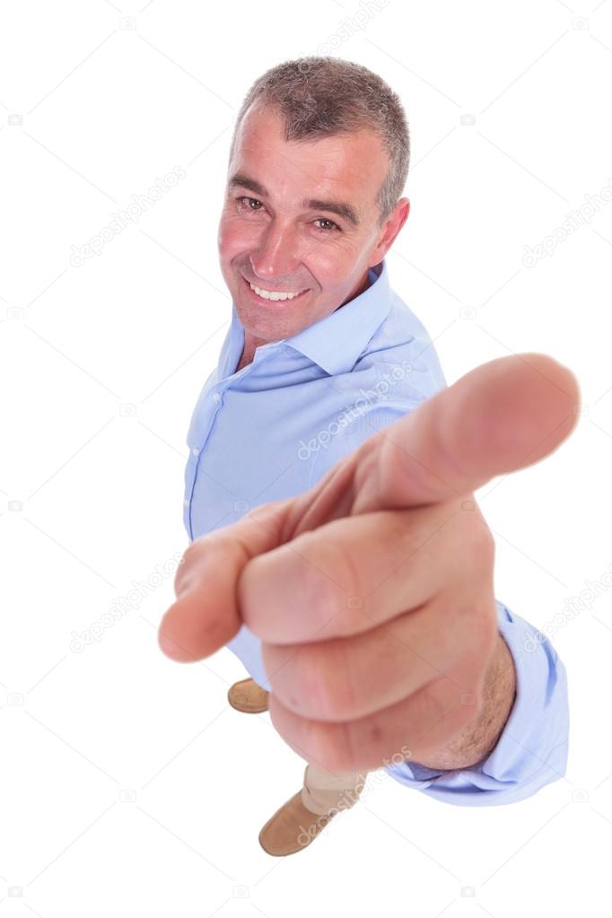 Casual old man pointing towards camera — Stock Photo © feedough #26353583 Casual old man pointing towards camera — Stock Photo © feedough #26353583