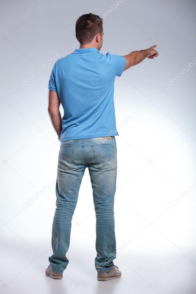 Back of a casual man pointing Stock Photo by ©feedough 30366239