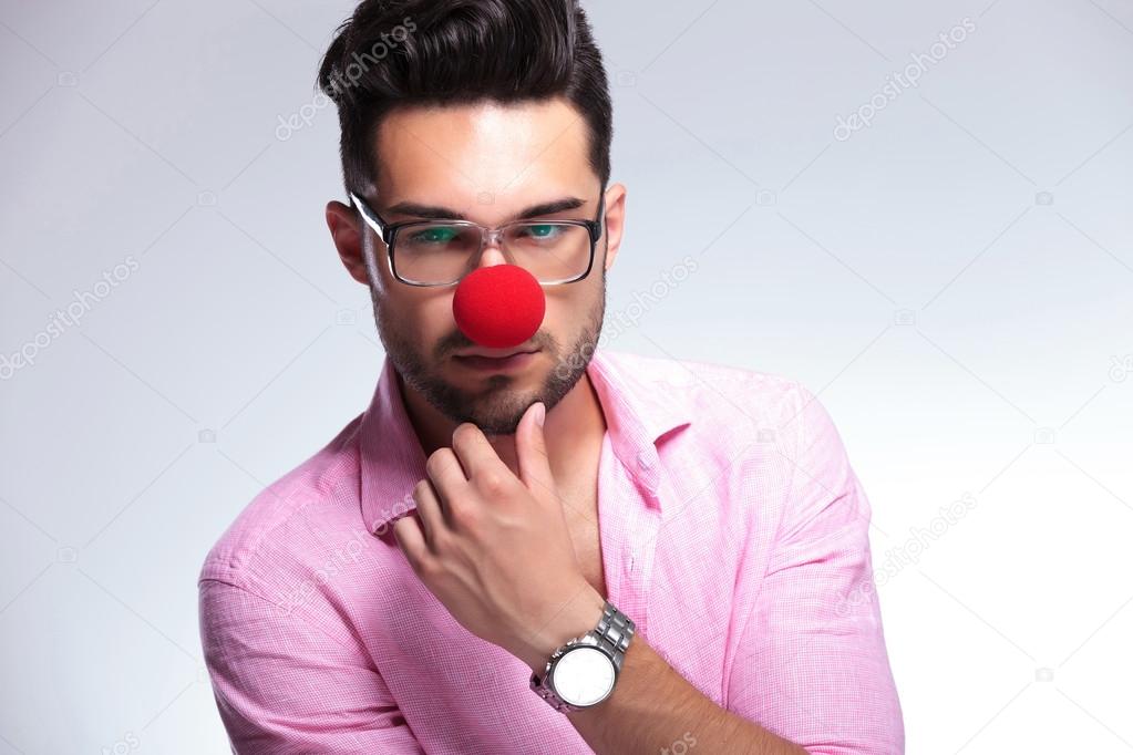 Pensive fashion young man with red nose — Stock Photo © feedough #31401263