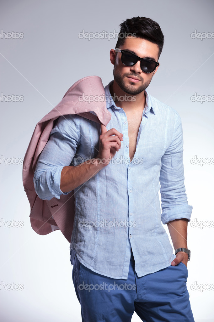 Casual man holds his jacket over his shoulder Stock Photo by ©feedough ...