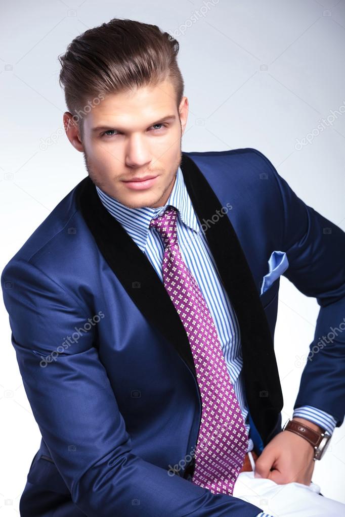 Seated young business man leaning forward — Stock Photo © feedough ...