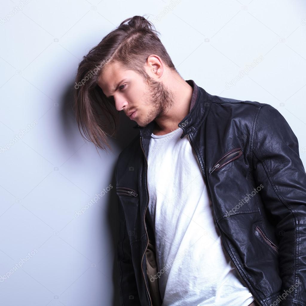 Side of a thoughtful young man in leather jacket — Stock Photo ...