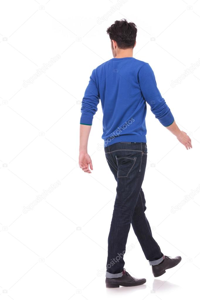 Back view of a walking casual man looking to a side Stock Photo by ...