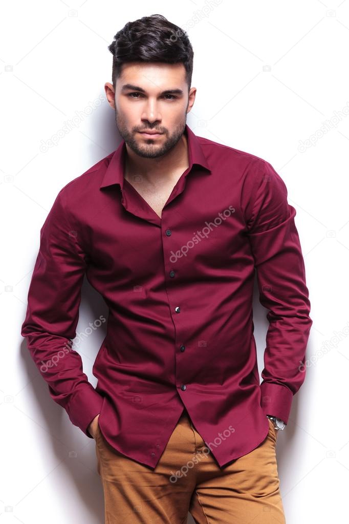 Casual man looks at you with hands in pockets Stock Photo by ©feedough ...