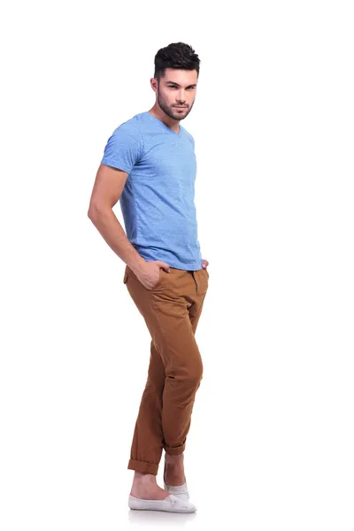 Man standing straight with hands at his back — Stock Photo © feedough ...