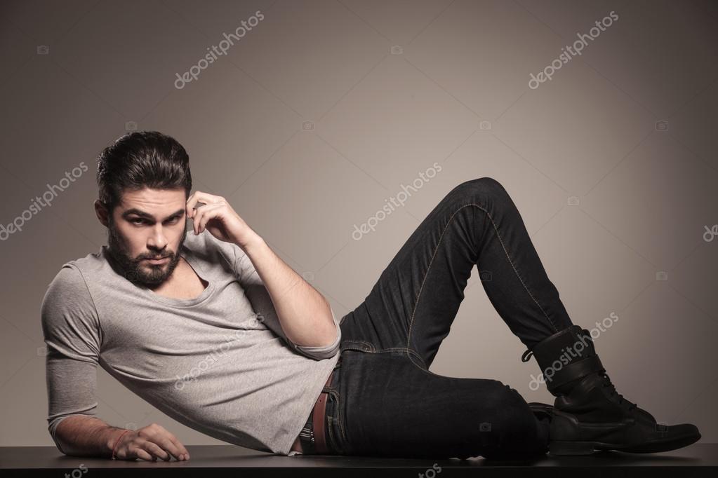 Man lying down on the floor and thinking — Stock Photo © feedough #46575565