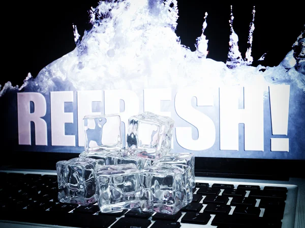 Ice cubes on computer keyboard — Stock Photo © netfalls #33572387
