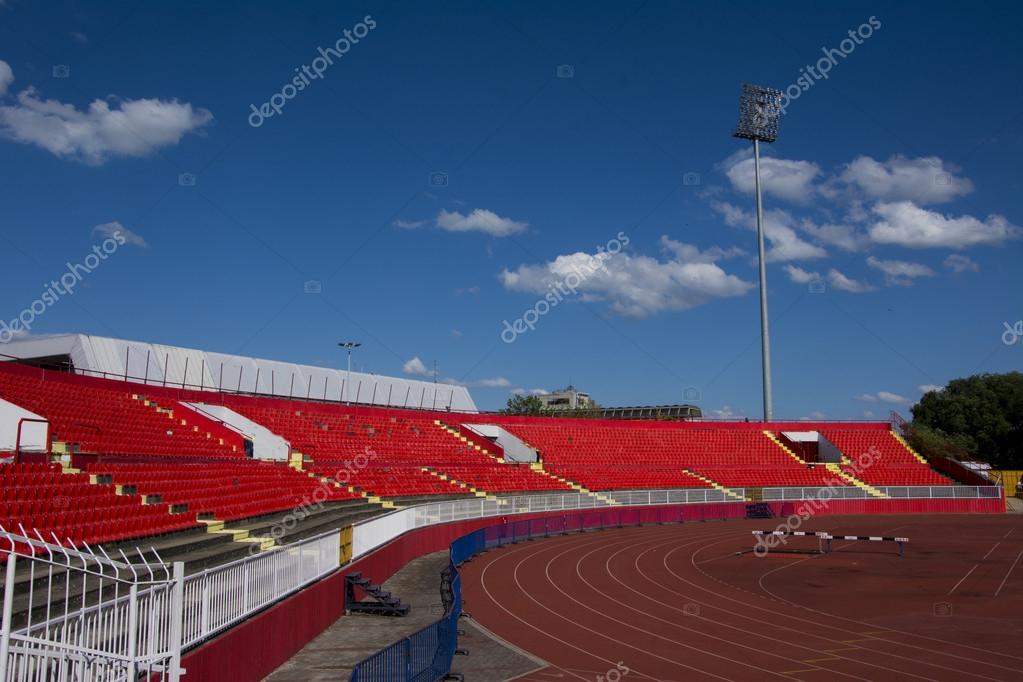 Seats red at stadium Stock Photo by ©predrag1 47367041