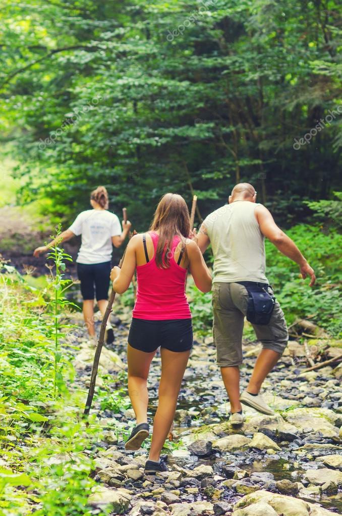 Father and his daughters exploring the nature Stock Photo by ...