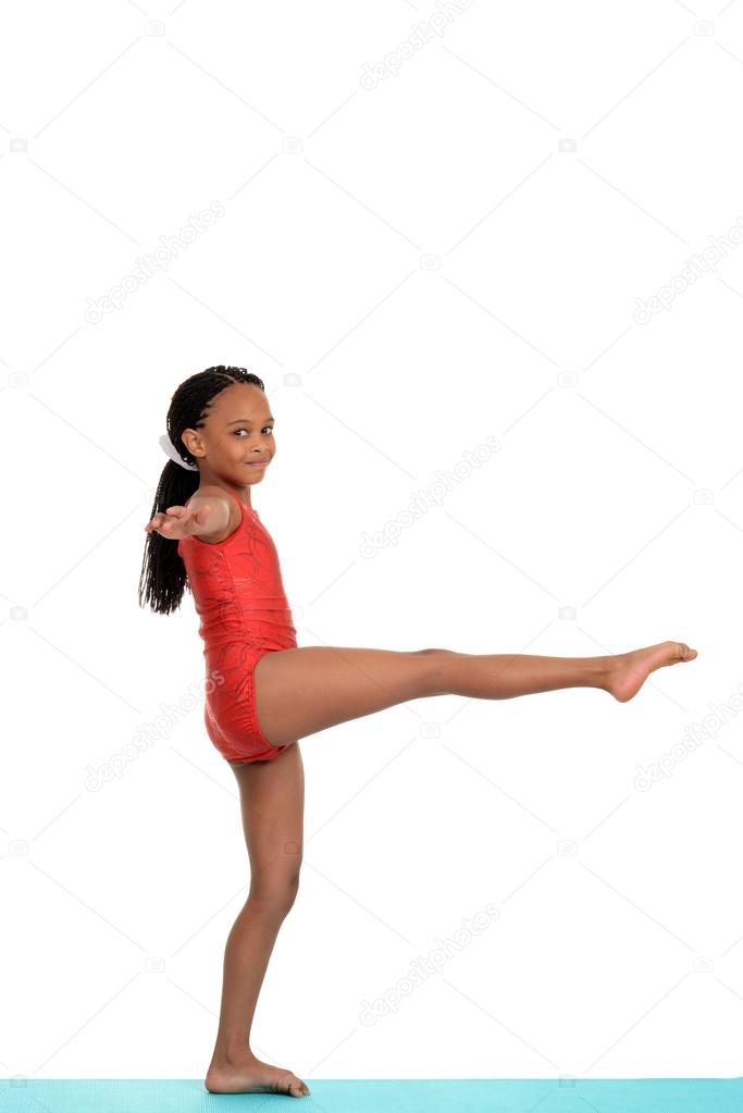 Young girl doing gymnastics balance move Stock Photo by ©mcgphoto 12905381